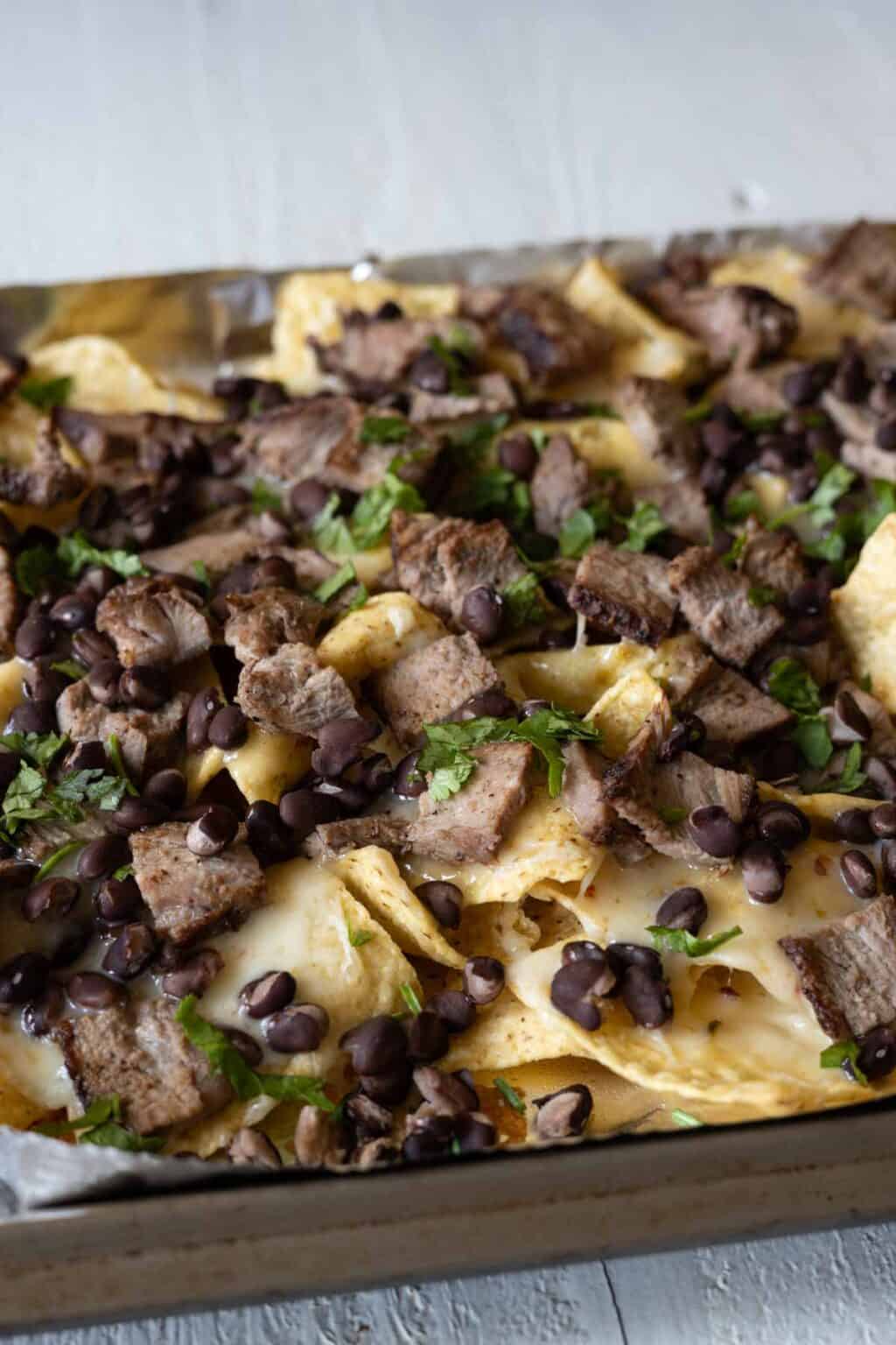 Easy Sheet Pan Steak Nachos Recipe Pitchfork Foodie Farms